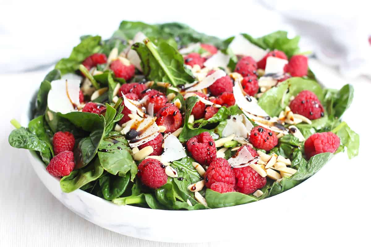 Spinach Raspberry Salad with Balsamic Reduction - Bite On The Side