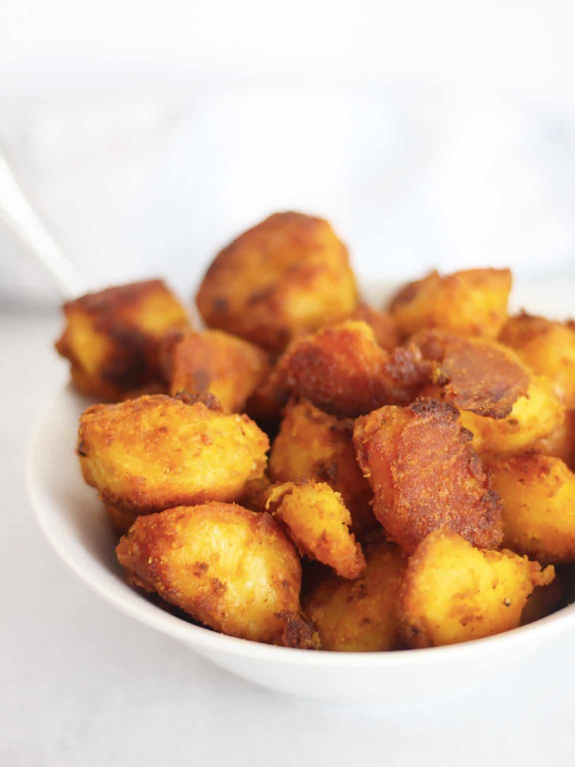 Roasted Turmeric Potatoes - Bite On The Side