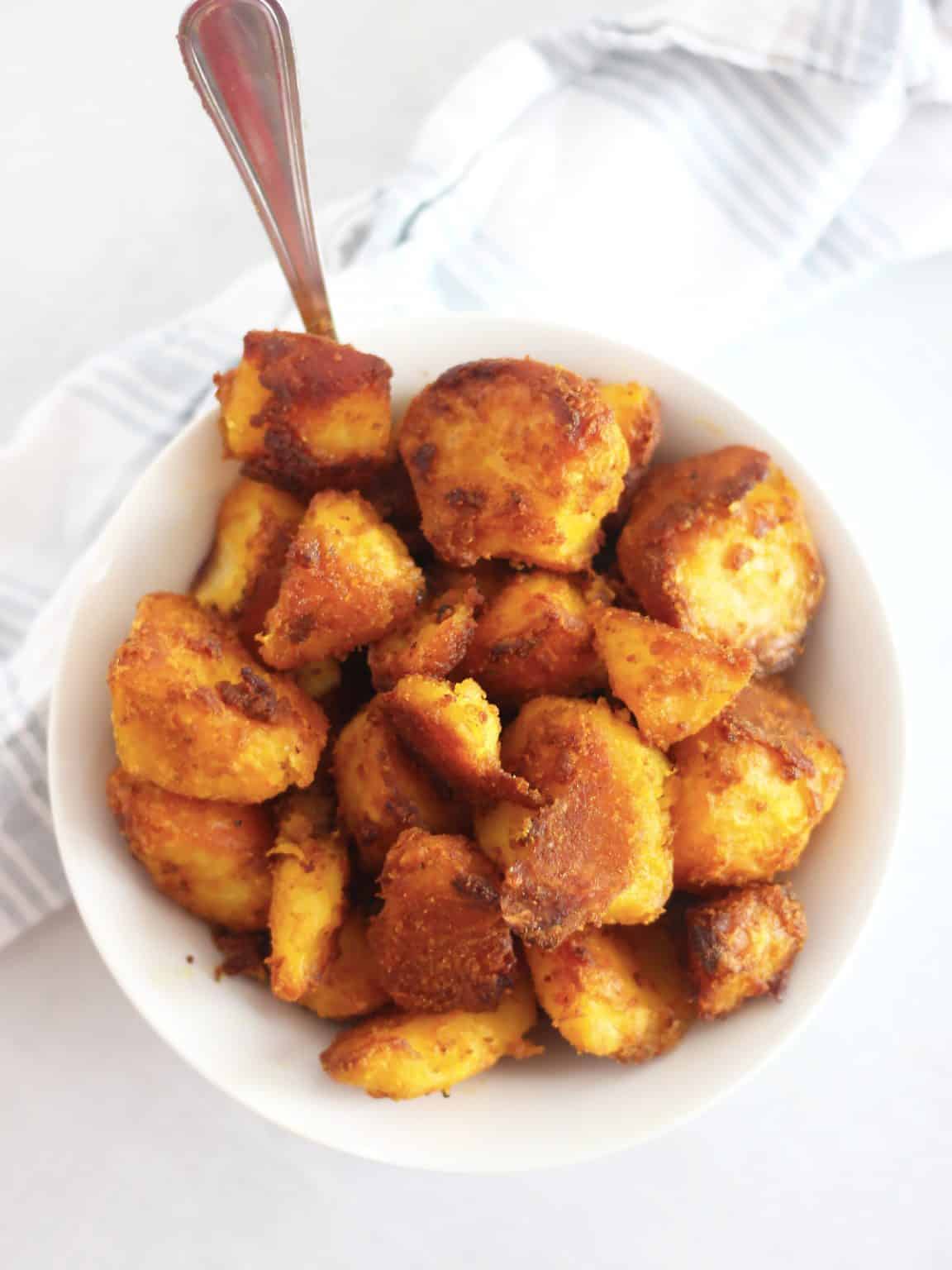 Roasted Turmeric Potatoes - Bite On The Side