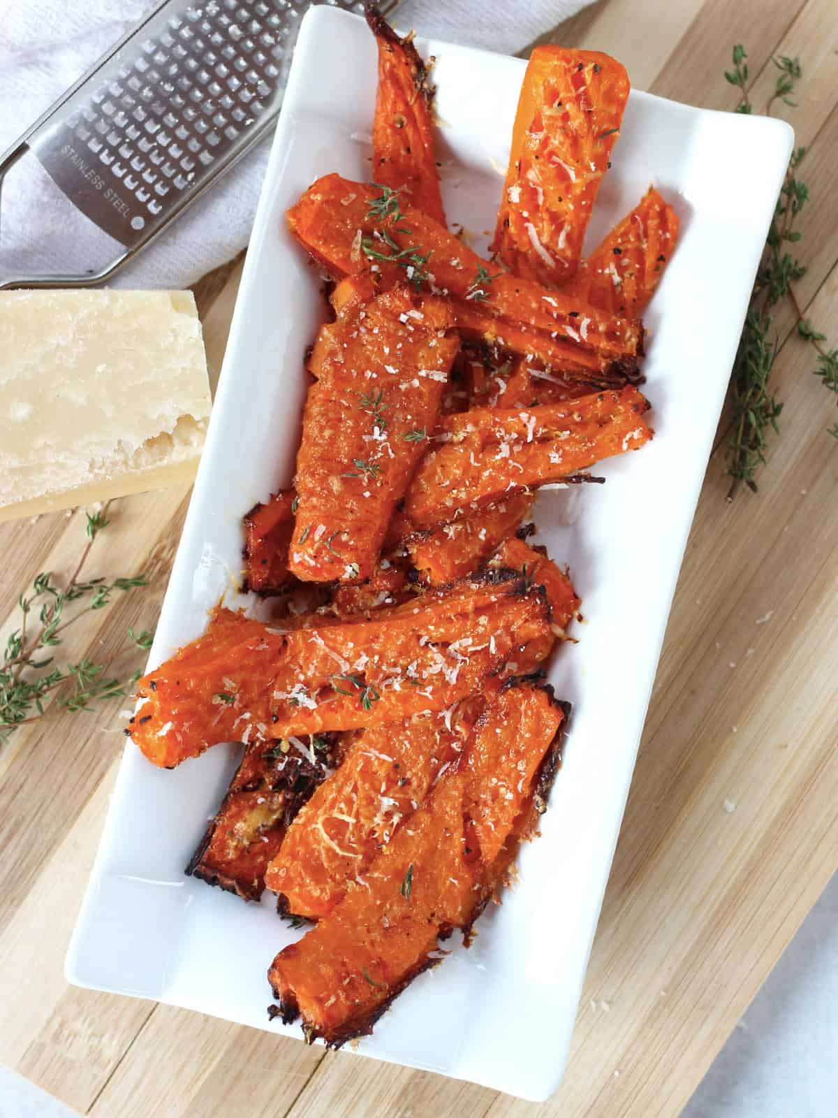 Smashed Carrots with Parmesan and Thyme - Bite On The Side