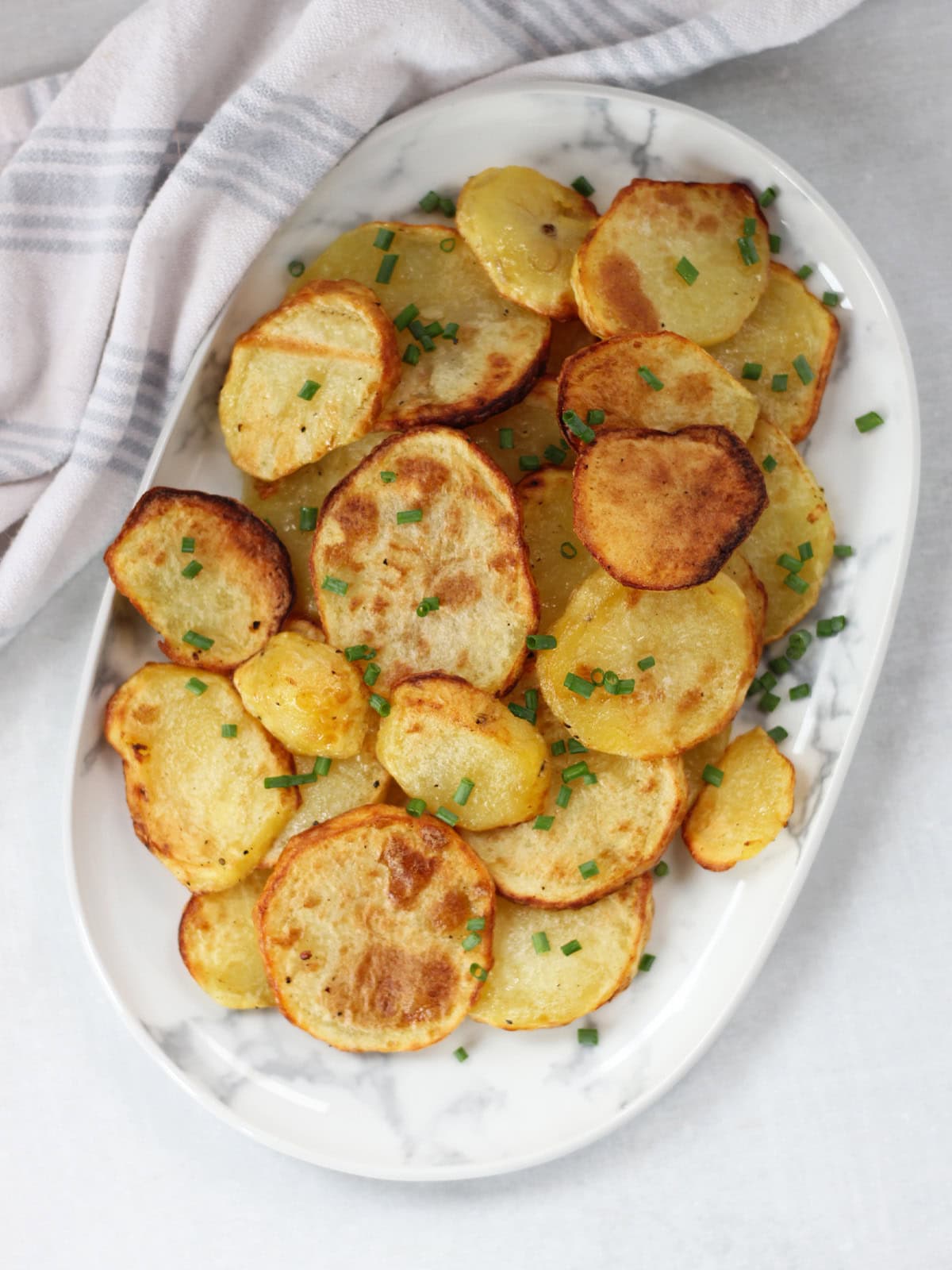 Air Fryer Crispy Sliced Potatoes - Bite On The Side